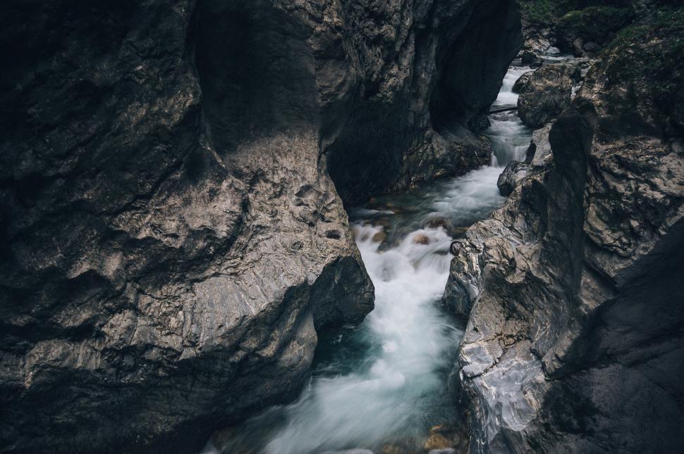 Free Stock Photo of Water Stream Flowing Between Two Large Rocks ...
