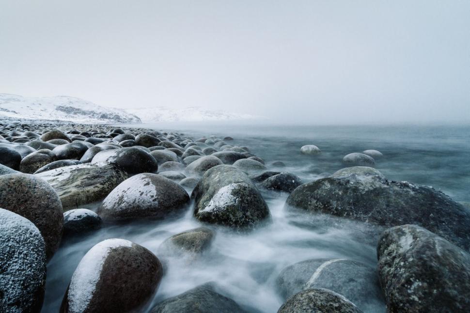 Free Stock Photo of Snow-Covered Rocky Beach Along Ocean Shore ...