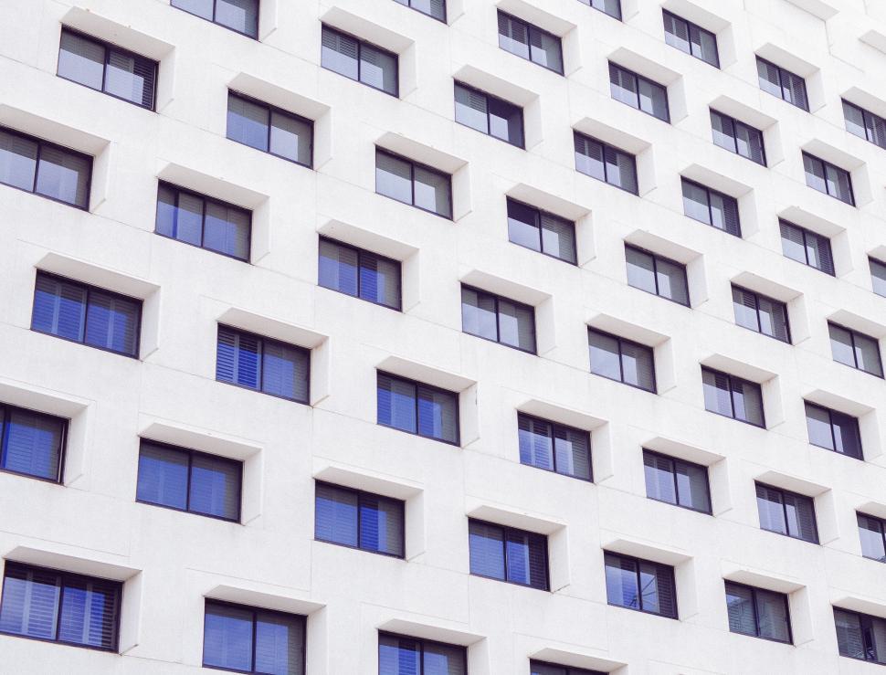 Free Stock Photo of Tall White Building With Lots of Windows | Download ...