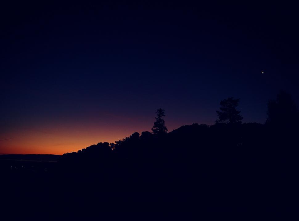 Free Stock Photo of Sun Setting Over Hill With Trees | Download Free ...