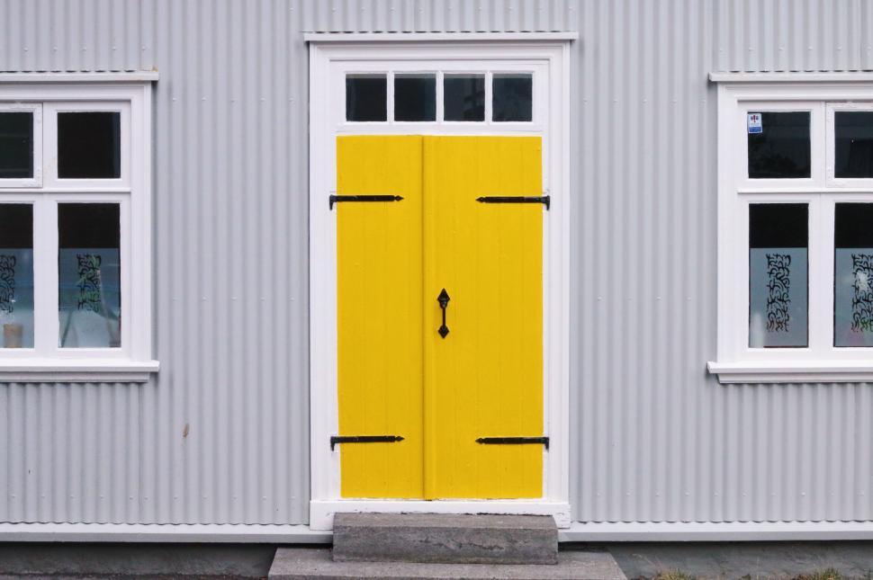Free Stock Photo of Yellow Door in Front of Gray Building | Download ...