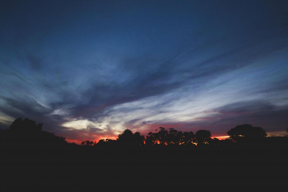 Free Stock Photo of Sun Setting Over Trees in Distance | Download Free ...