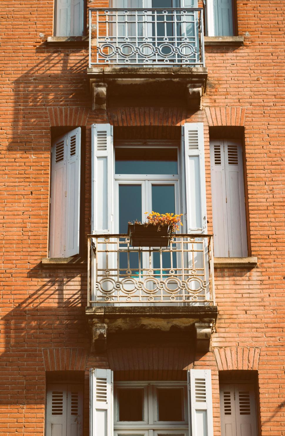 Free Stock Photo of Tall Brick Building With Balcony and Balconies ...