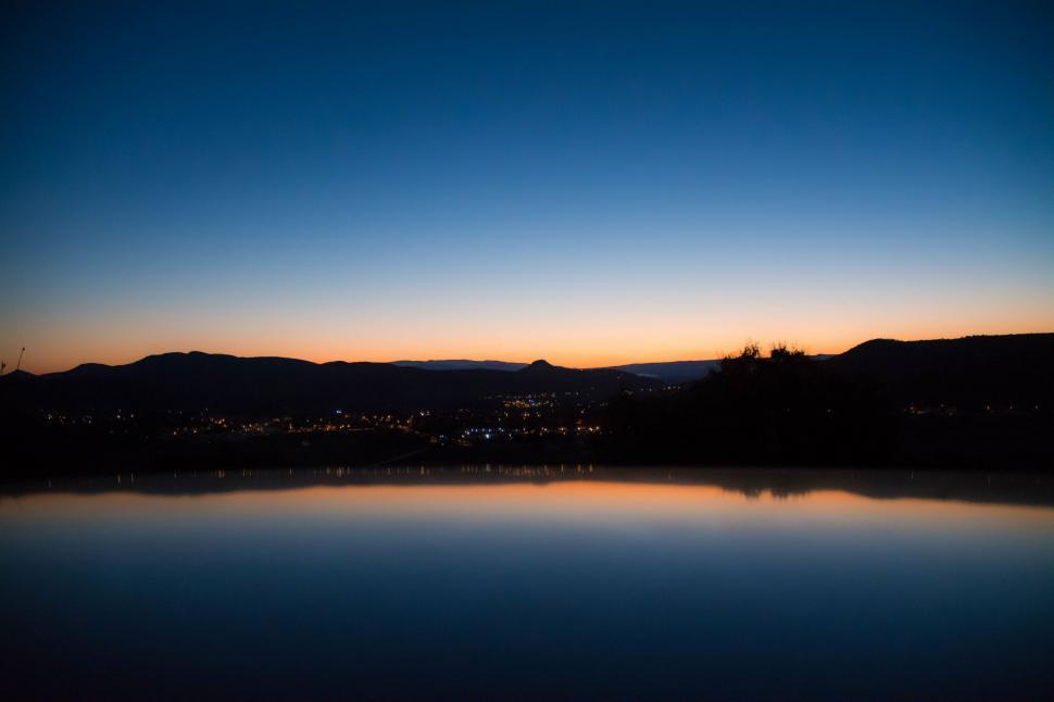 Free Stock Photo of Majestic Mountains Towering Over Water Body ...