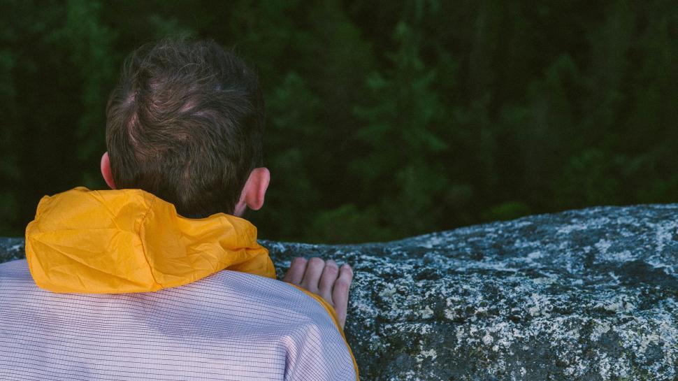 Free Stock Photo of Man in Yellow Jacket Observing a Rock | Download ...