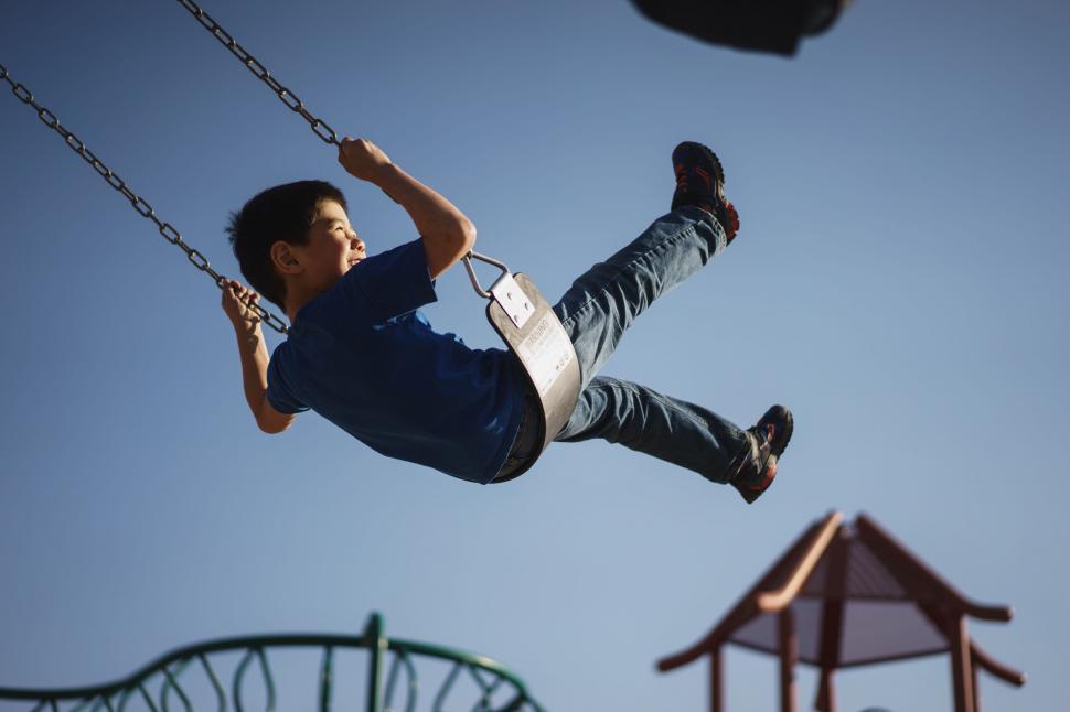 Free Stock Photo of Man Swinging on Swing in Park | Download Free ...