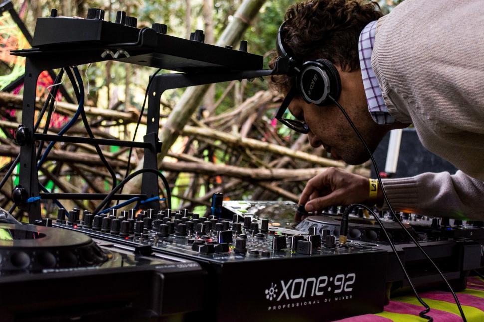 Free Stock Photo of Man Mixing Music With Headphones | Download Free ...