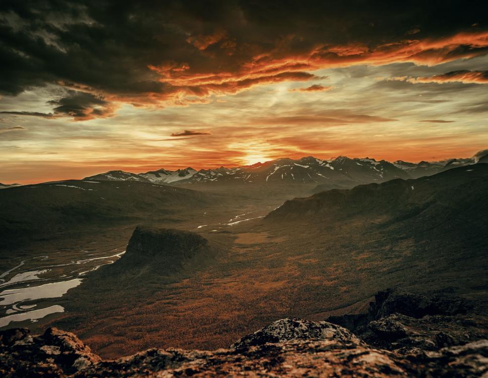 Free Stock Photo of The Sun Setting Over a Mountain Range | Download ...