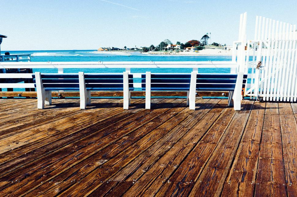 Free Stock Photo of Wooden Deck and White Fence by Waterfront ...