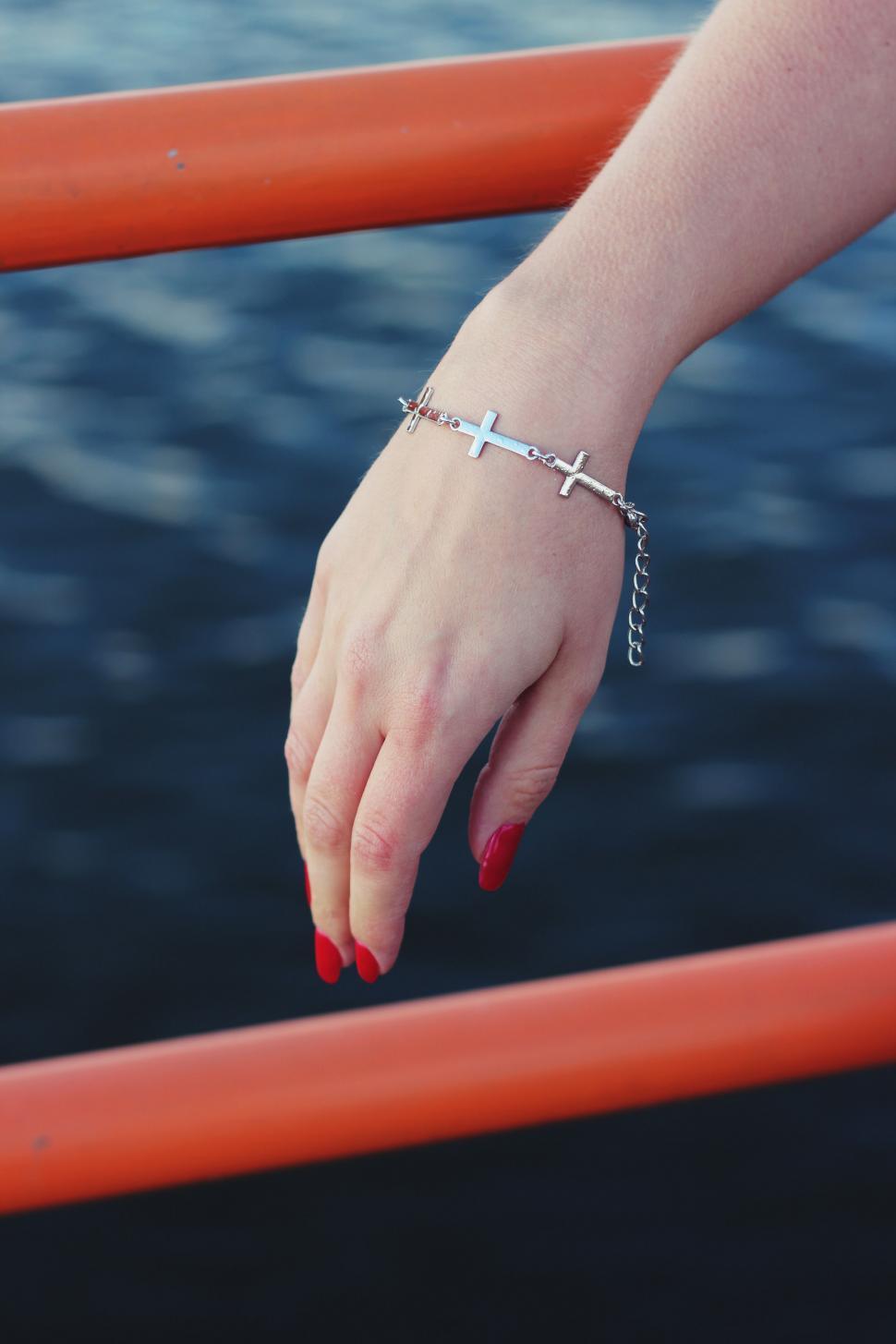 Free Stock Photo of Womans Hand With Cross Bracelet | Download Free ...