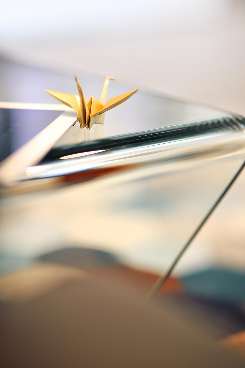 Free Stock Photo of Yellow Origami Bird Perched on Car Hood | Download ...