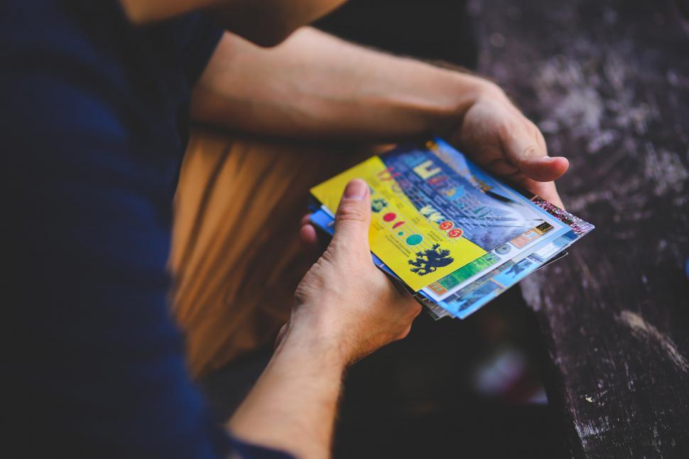 Free Stock Photo of Person Holding a Card in Their Hand | Download Free ...
