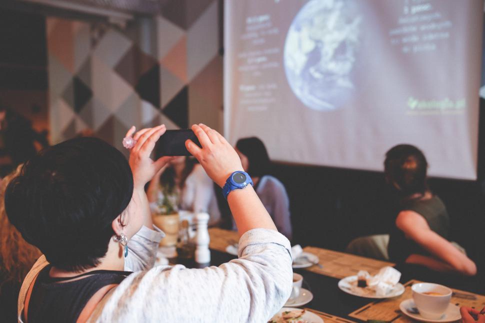 Free Stock Photo of Group of People Sitting at Table in Front of ...