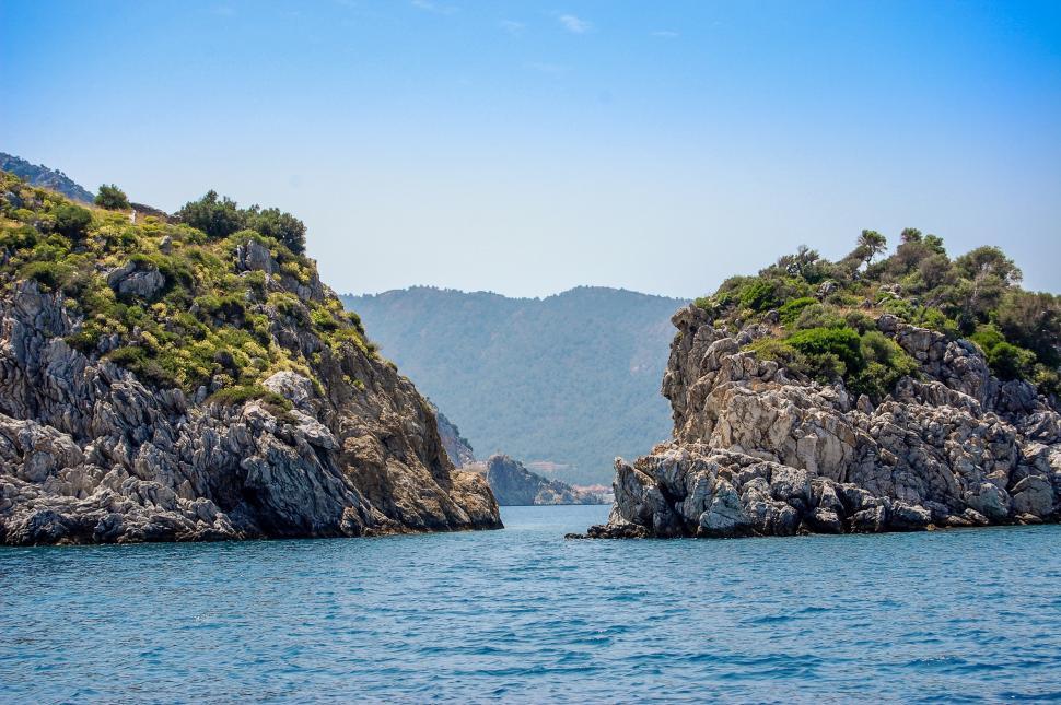 Free Stock Photo of Two Large Rocks in Middle of Body of Water ...