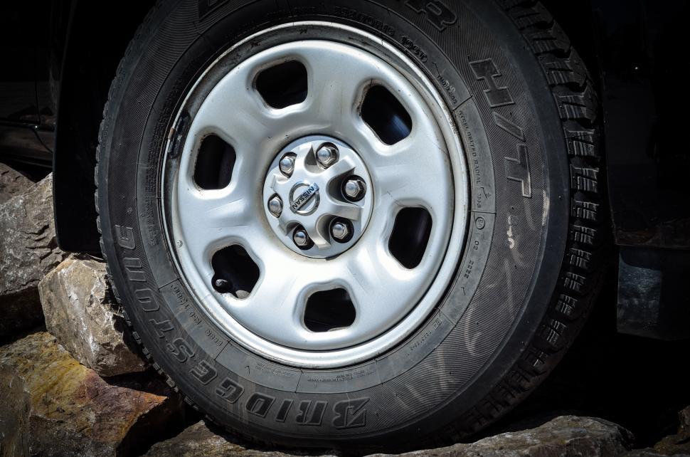 Free Stock Photo of Close Up of Tire Resting on Rock | Download Free ...