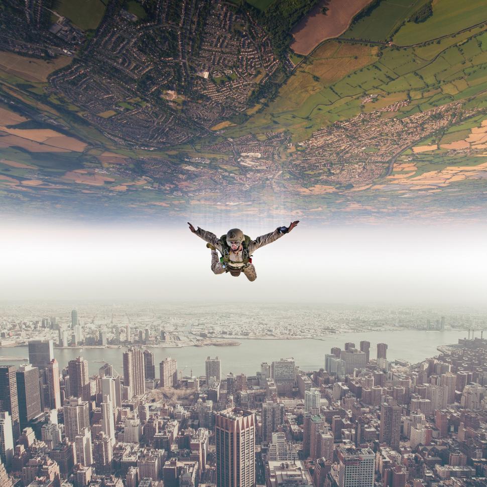 Free Stock Photo of Man Flying Through the Air Over a City | Download ...