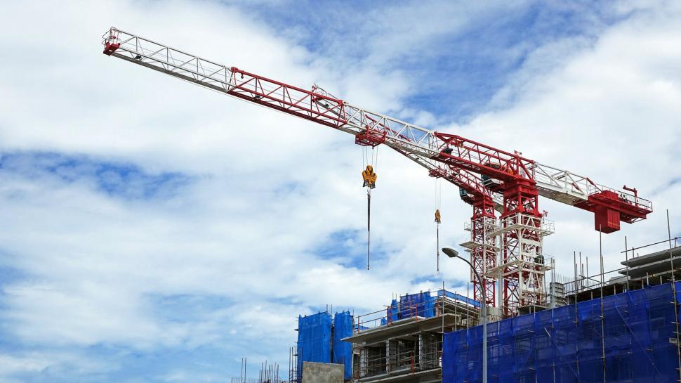 Free Stock Photo of Large Crane on Top of Building Under Construction ...