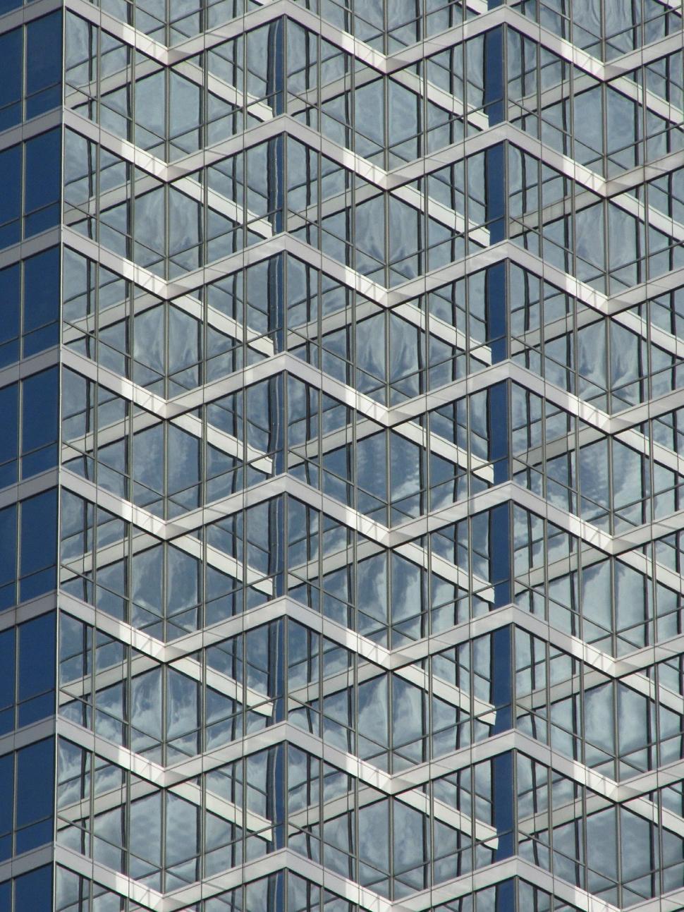 Free Stock Photo of Towering Building Covered With Numerous Windows ...