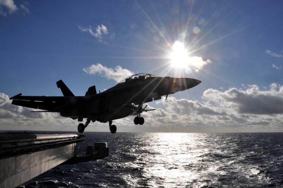 Free Stock Photo of Fighter Jet Flying Over a Body of Water | Download ...