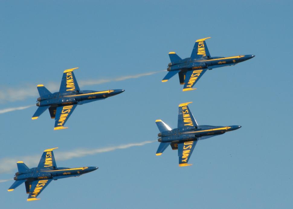 Free Stock Photo of Four Fighter Jets Flying in Formation in a Blue Sky ...