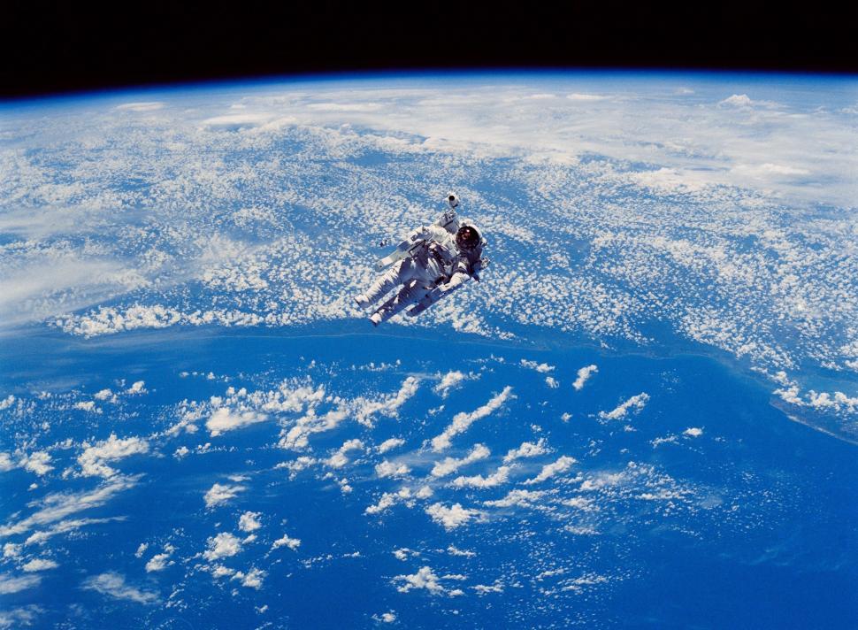 Free Stock Photo of Astronaut Floating Above Earth | Download Free ...