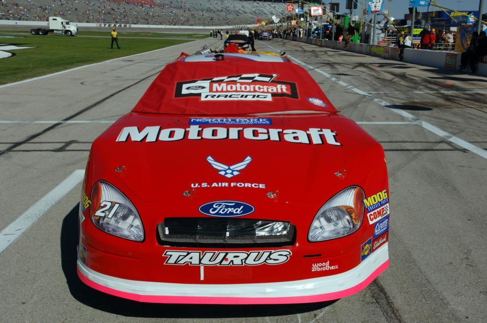 Free Stock Photo of Red Race Car Speeding Down Race Track | Download ...