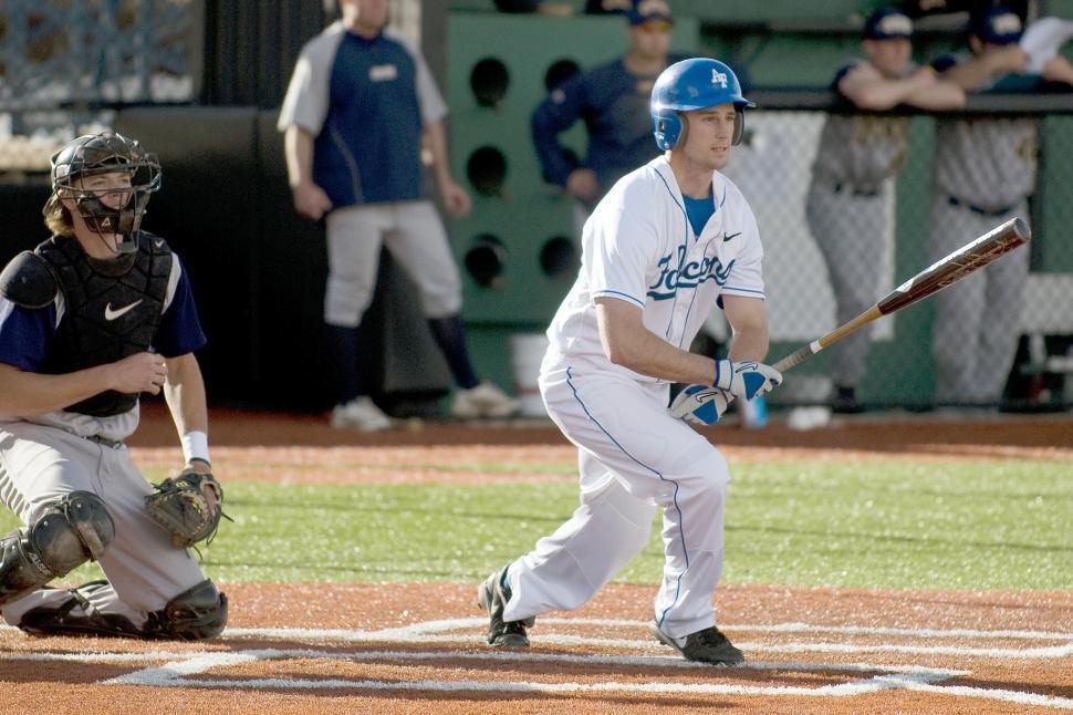 Free Stock Photo of Baseball Player Holding Bat Next to Home Plate ...