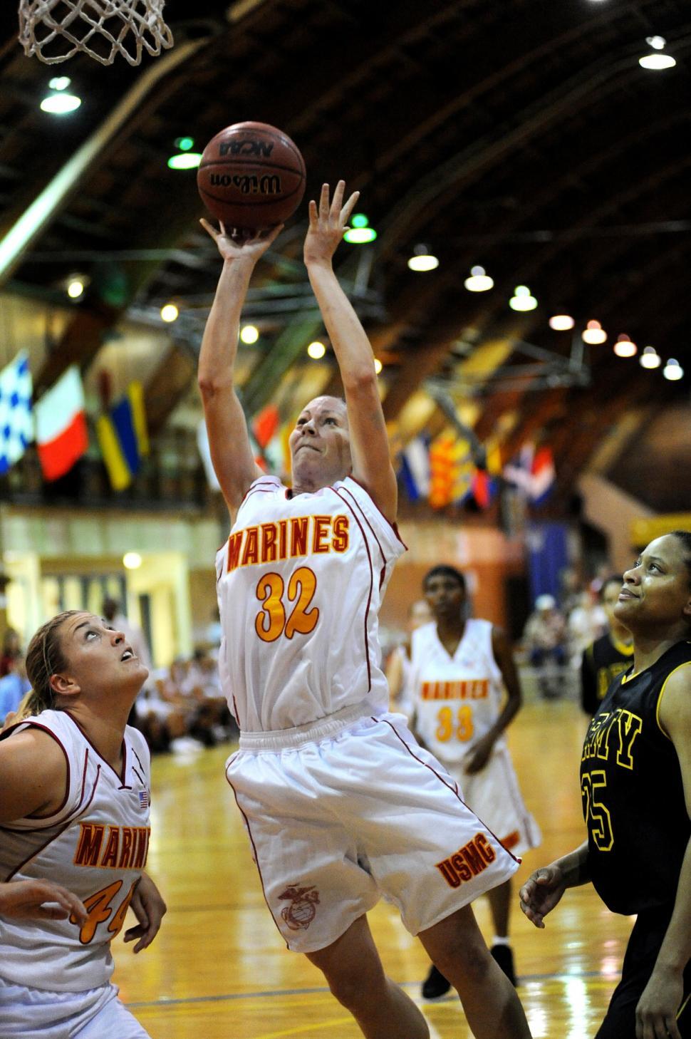 Free Stock Photo of Intense Womens Basketball Game With Ball Mid-Air ...
