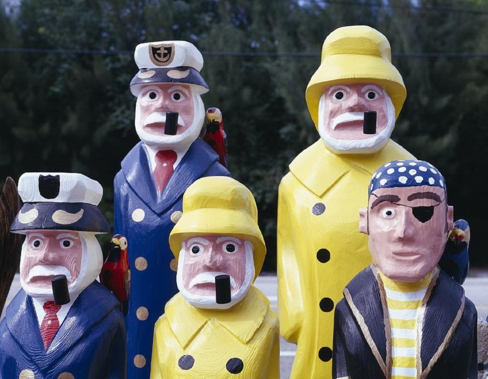 Free Stock Photo of Group of Statues of Men in Yellow and Blue ...