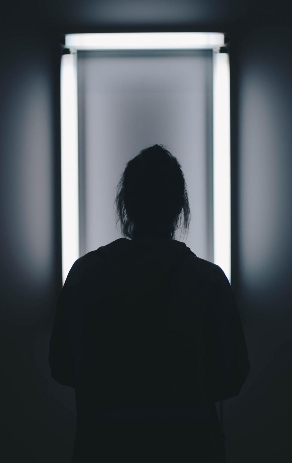 Free Stock Photo of Person Standing in Front of Mirror in Dark Room ...