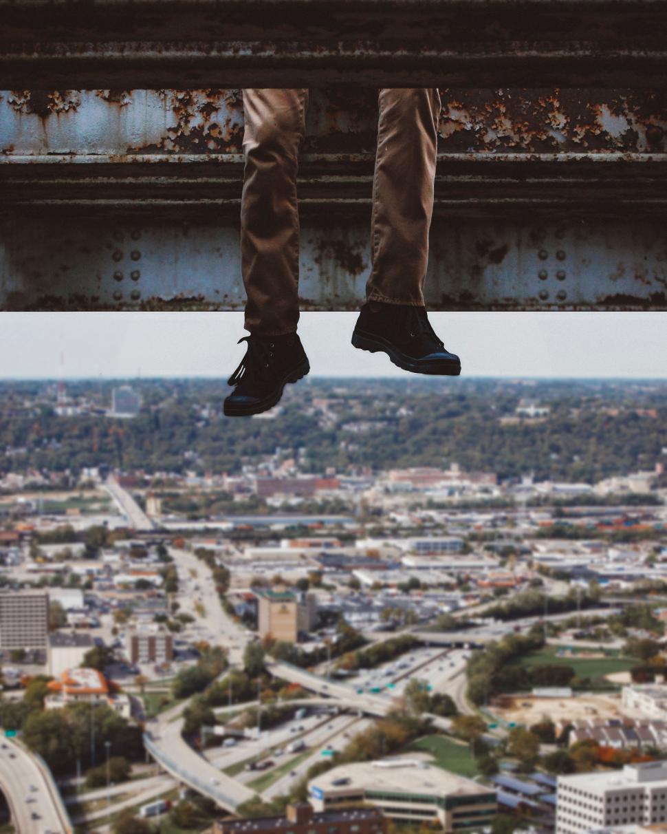 Free Stock Photo of Person Sitting on Ledge Above City | Download Free ...