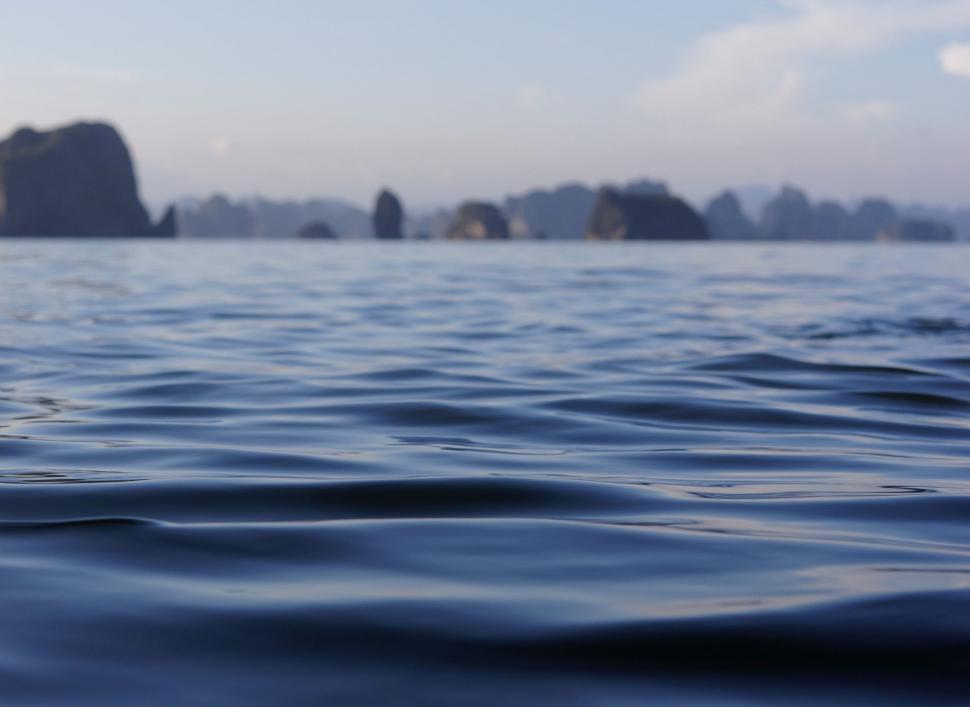 Free Stock Photo of Body of Water With Rocks in Background | Download ...