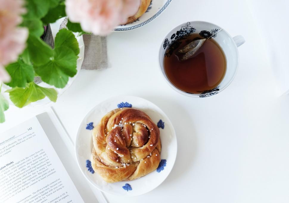Free Stock Photo of A Cup of Tea and Plate of Food on a Table ...