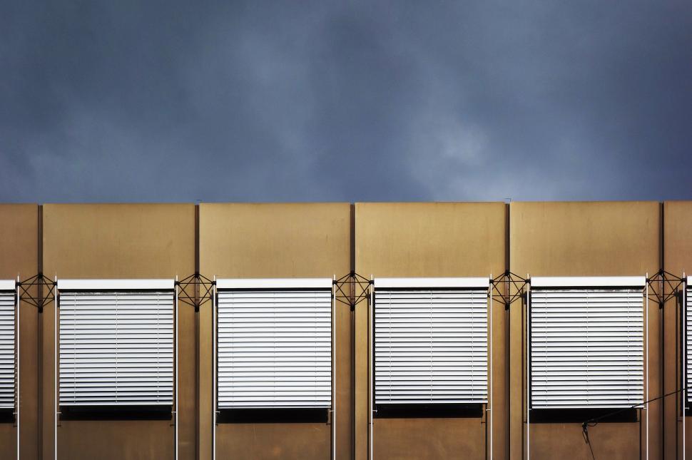 Free Stock Photo of Row of Closed Shutters on Side of Building ...