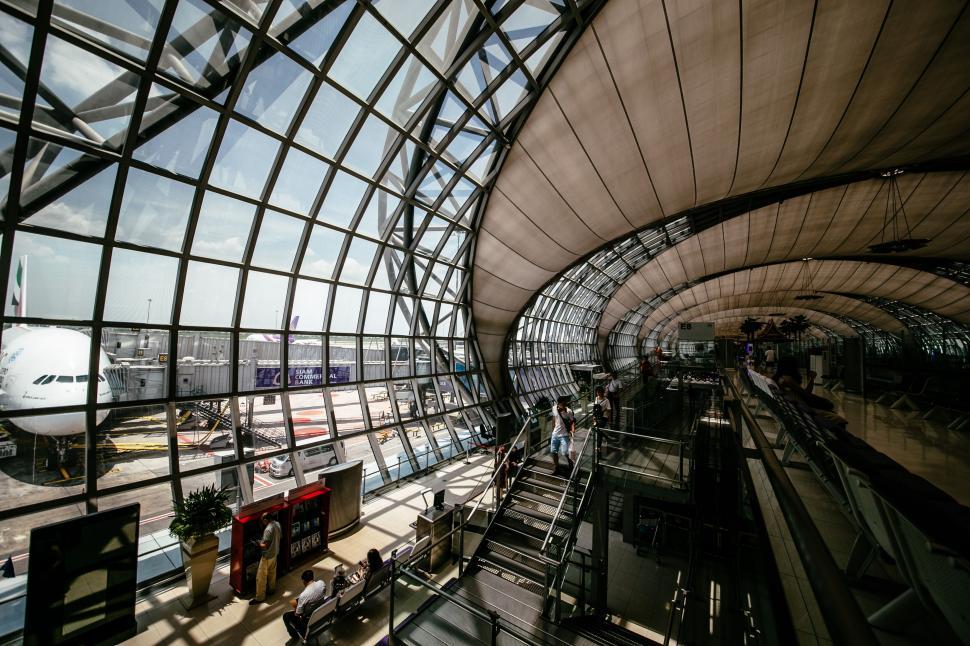 Free Stock Photo of Inside an Airport Terminal With Plane in Background ...