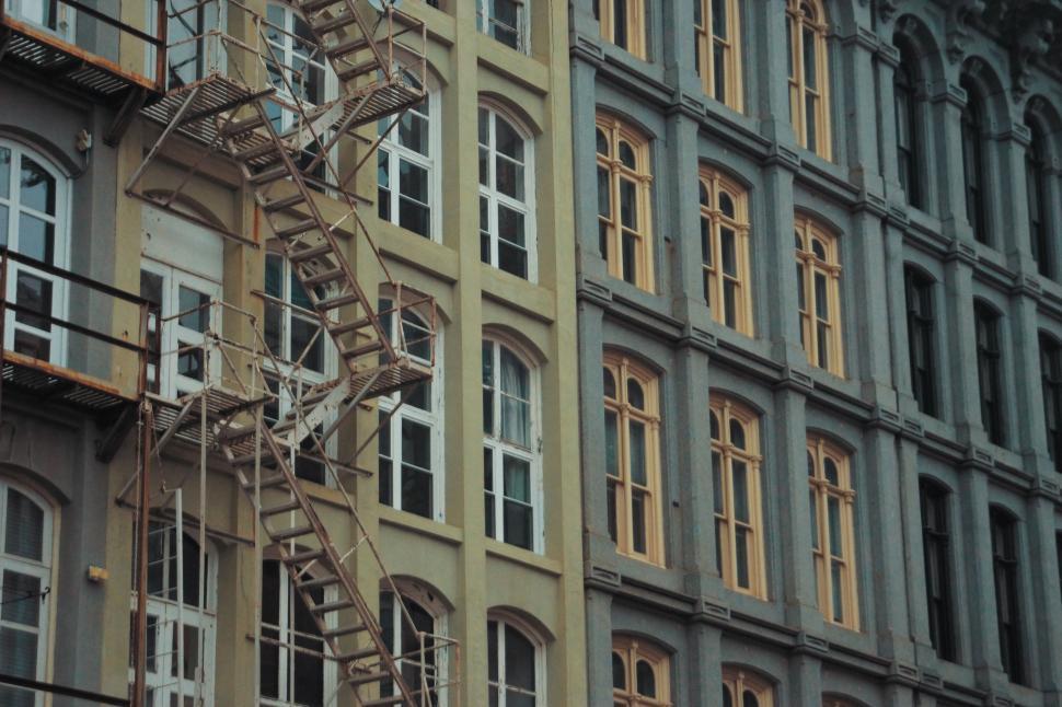 Free Stock Photo of Tall Building With Many Windows and Fire Escape ...