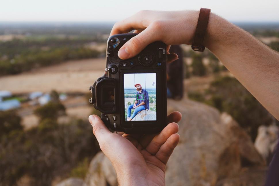 Free Stock Photo of Person Holding Camera to Capture Image | Download ...