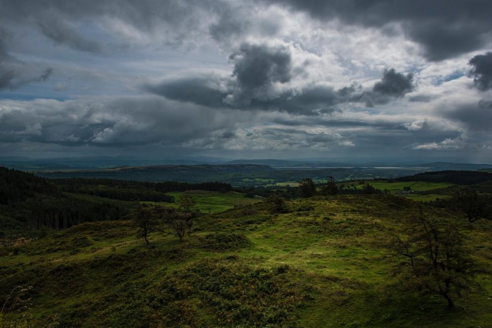 Free Stock Photo of Green Field Under Dark Clouds | Download Free ...