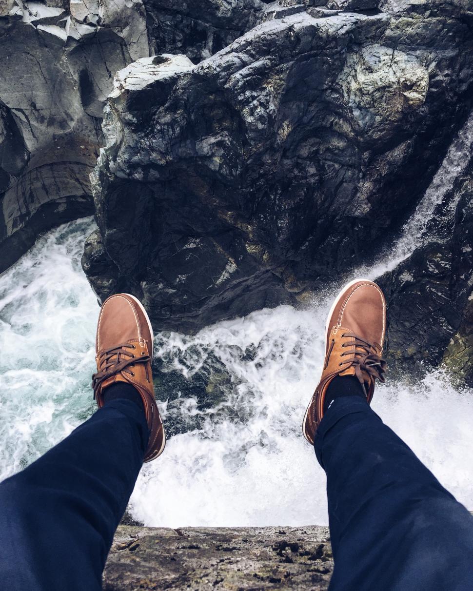Free Stock Photo of Person Standing on Top of Rock by Water | Download ...