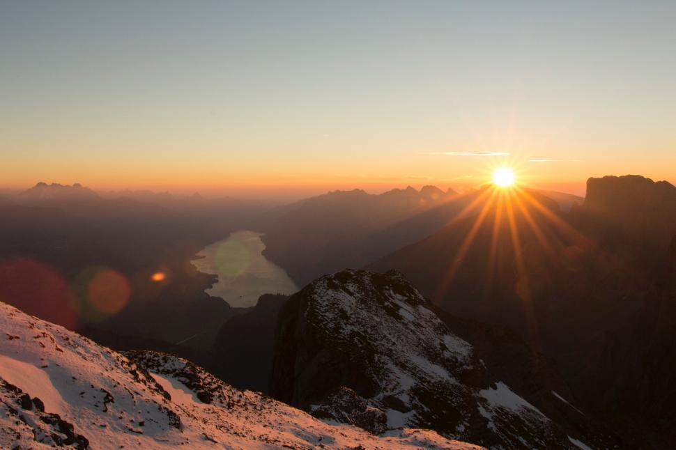 Free Stock Photo of Sun Setting Over Mountain Range | Download Free ...