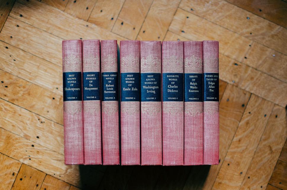 Free Stock Photo of Stack of Pink Books on Wooden Floor | Download Free ...