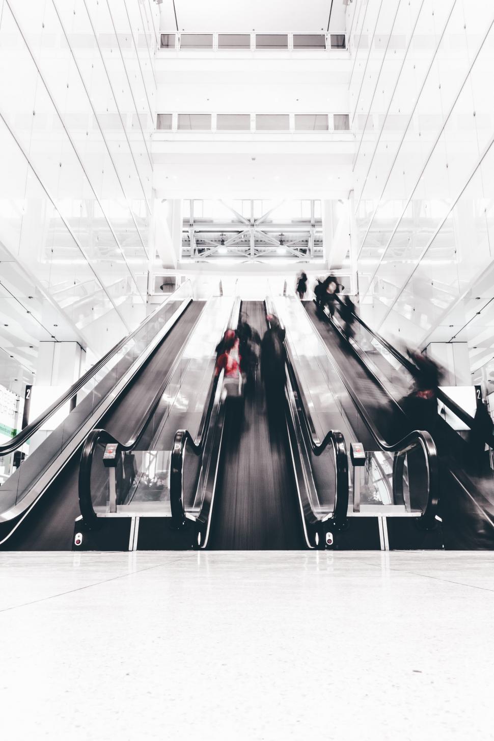 Free Stock Photo of Group of People Riding Down Escalator in Building ...
