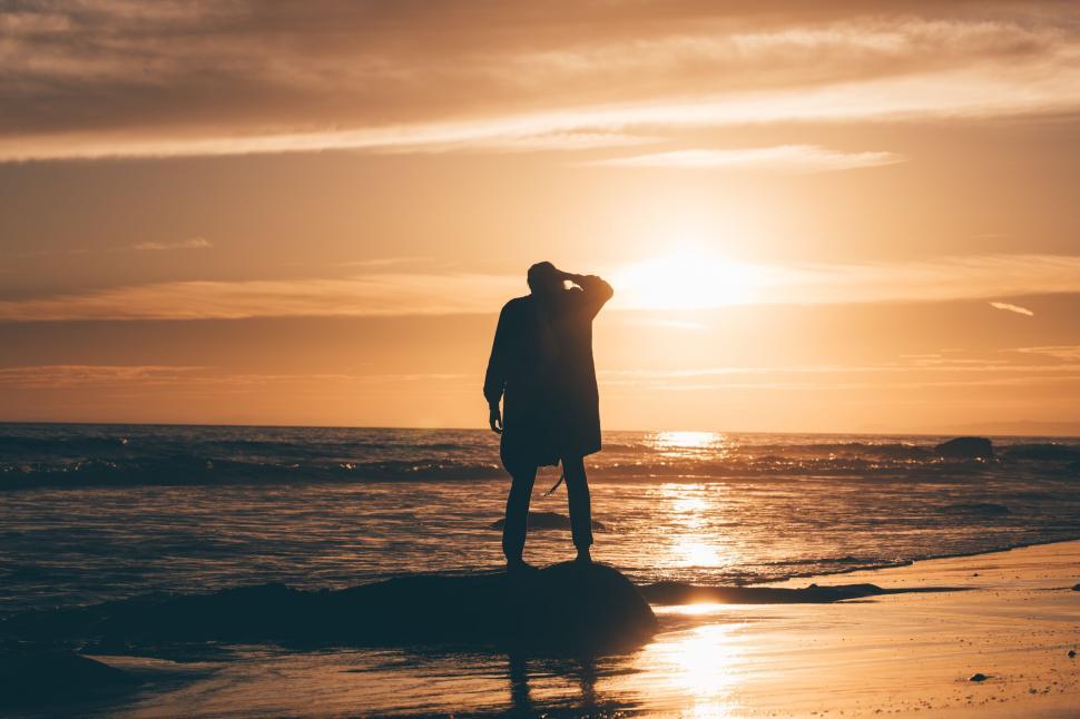Free Stock Photo of Person Standing on Beach at Sunset | Download Free ...