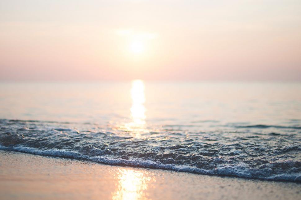 Free Stock Photo of Sun Setting Over Water at Beach | Download Free ...